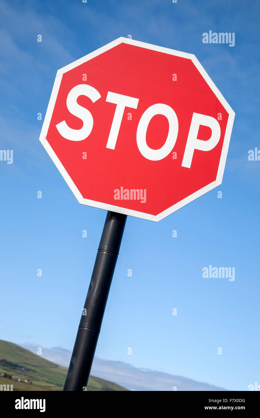 Red Stop Traffic Sign on Blue Sky Background Stock Photo - Alamy