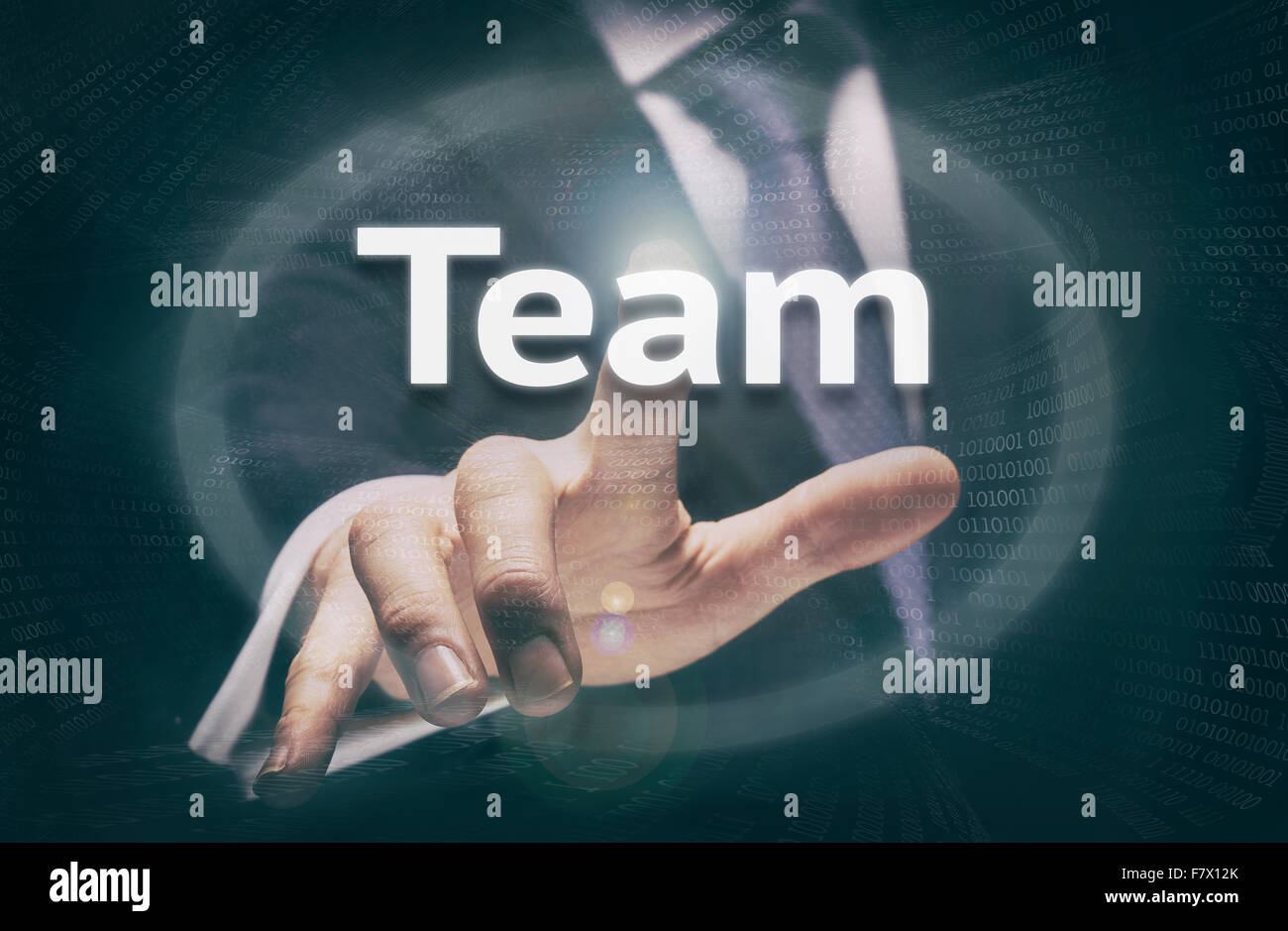 Businessman pressing an Team concept button Stock Photo - Alamy