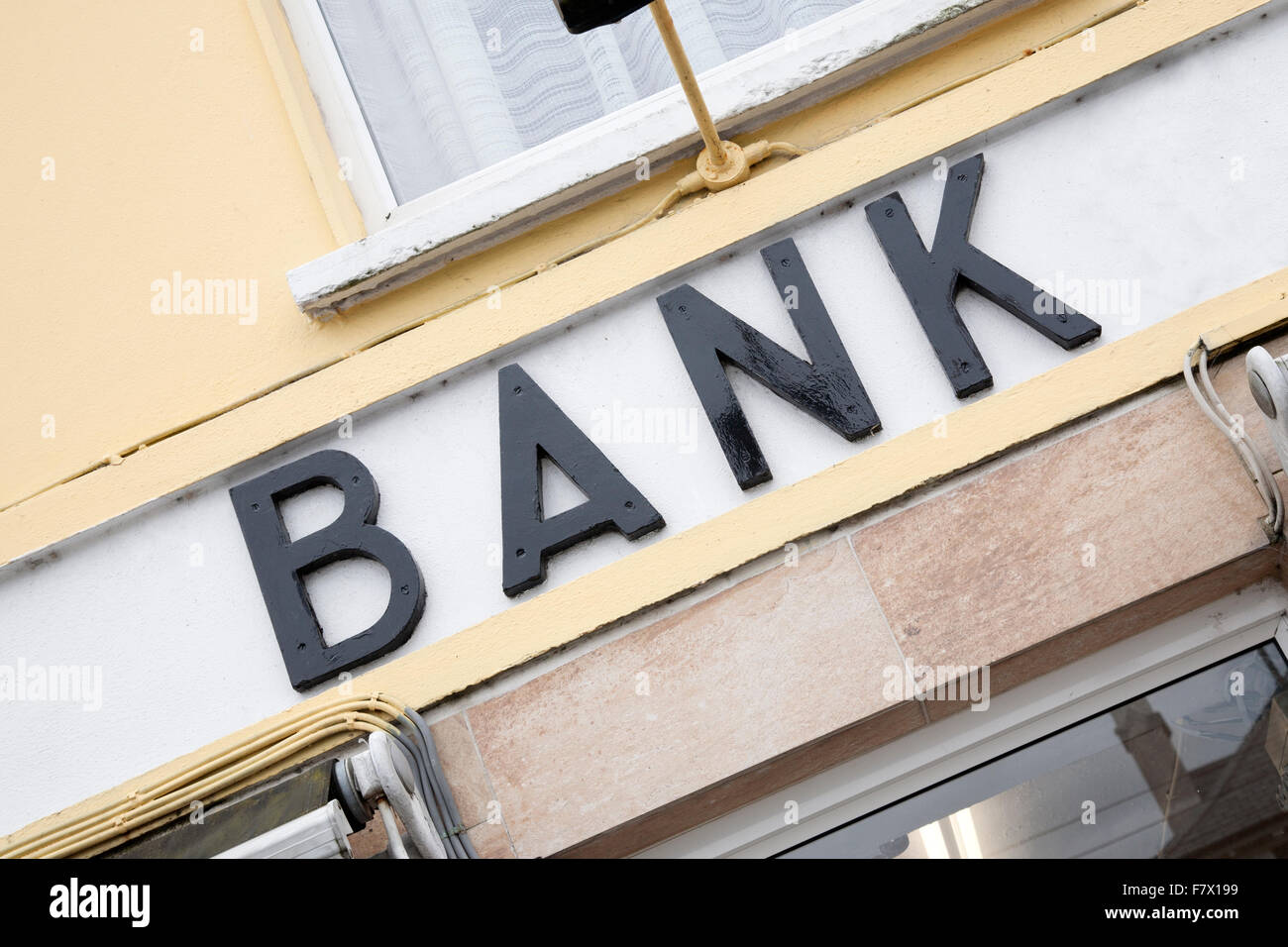 Old Bank Sign on Building Facade Stock Photo - Alamy