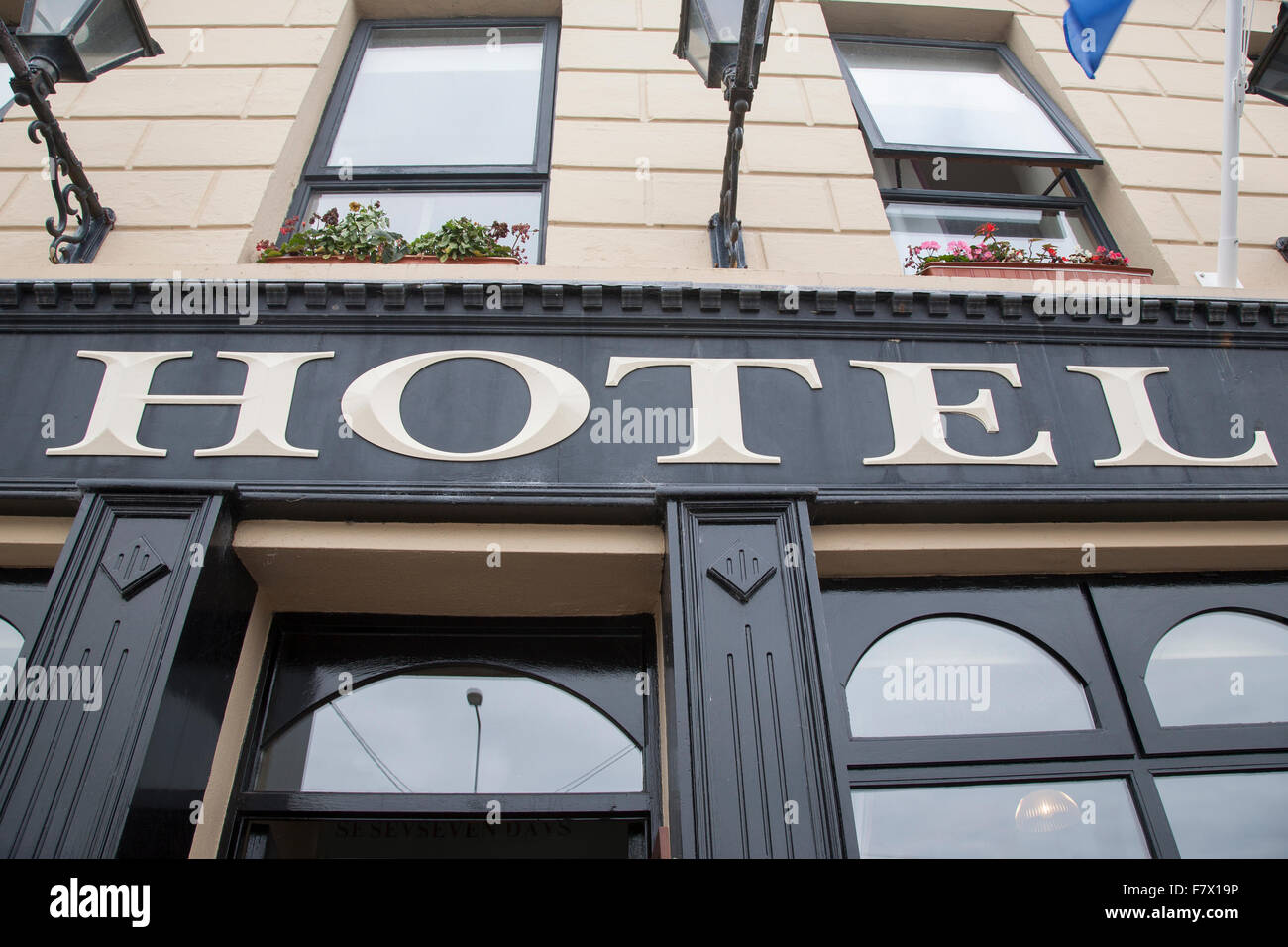 Hotel Sign on Building Facade Stock Photo - Alamy