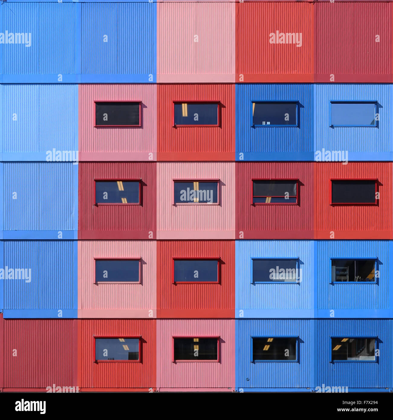 Multi-colored containers stacked on top of each other Stock Photo - Alamy