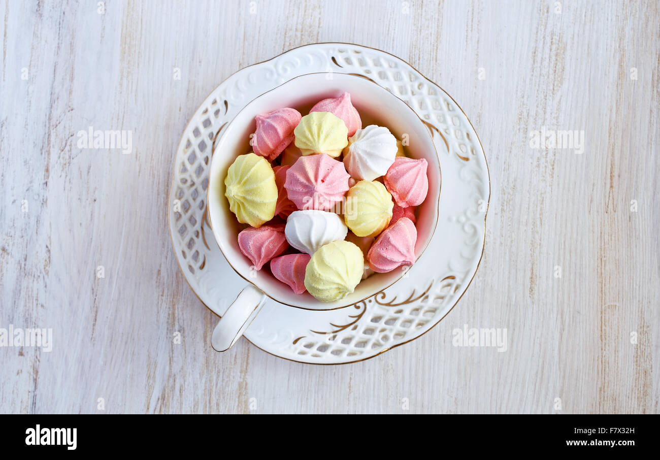 Colored meringue in a cup Stock Photo - Alamy