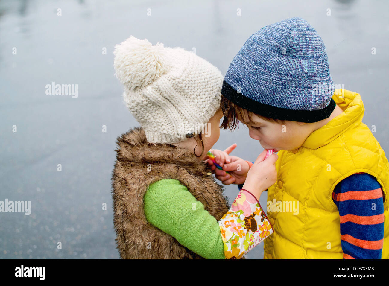 Sharing childhood hi-res stock photography and images - Alamy