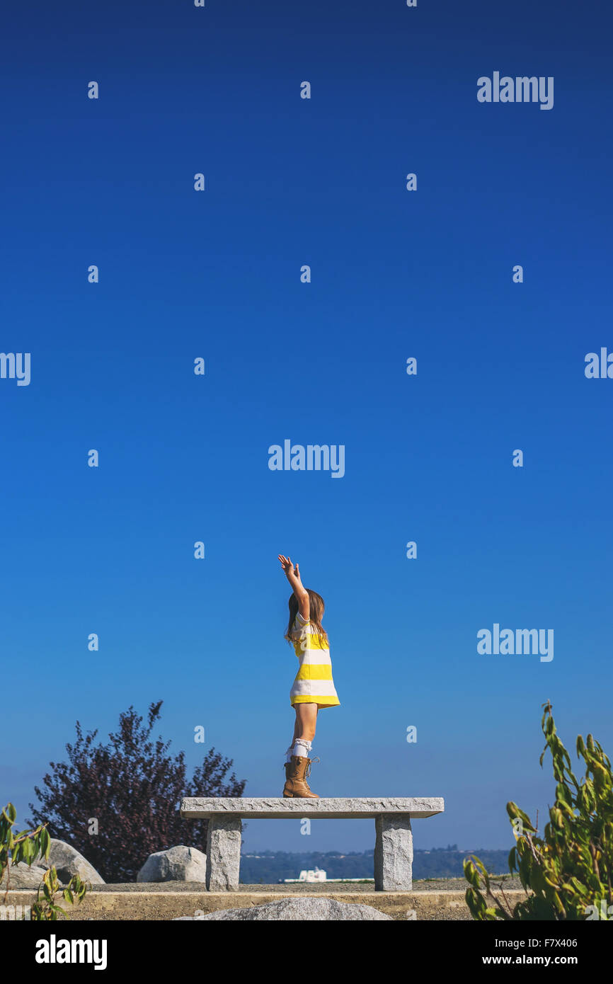 Girl on bench hi-res stock photography and images - Alamy