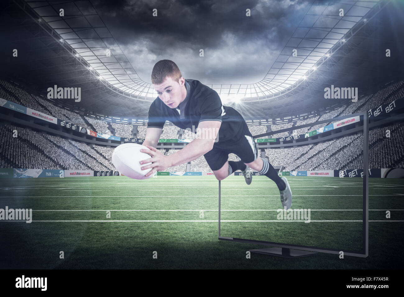 Composite image of a rugby player scoring a try Stock Photo - Alamy