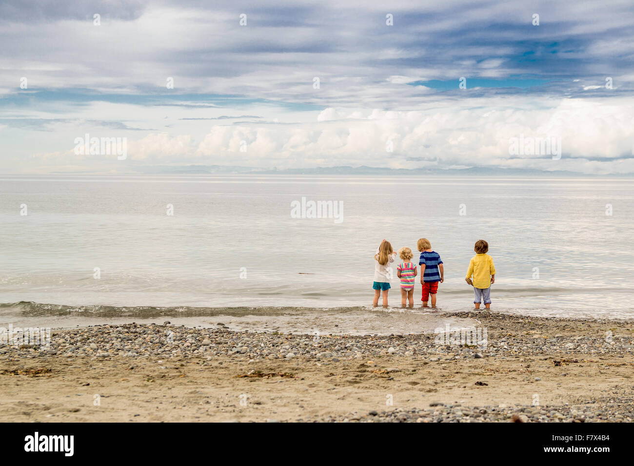 Four children hi-res stock photography and images - Alamy