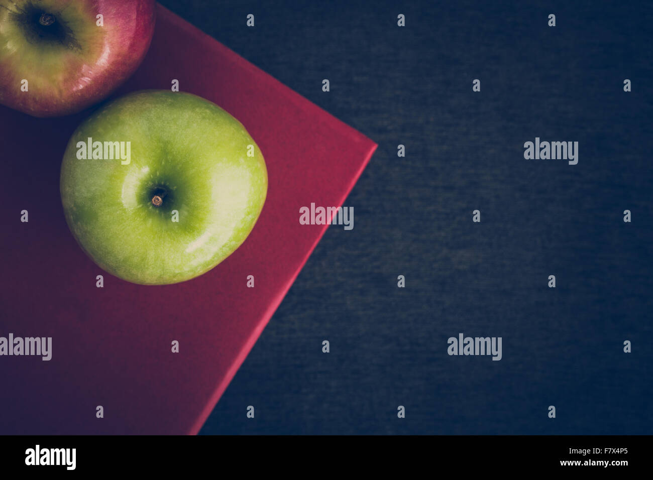 Green apple with book illustrated knowledge and wisdom concept Stock ...