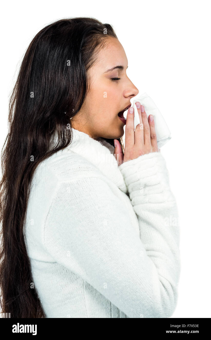 Attractive woman blowing her nose Stock Photo - Alamy