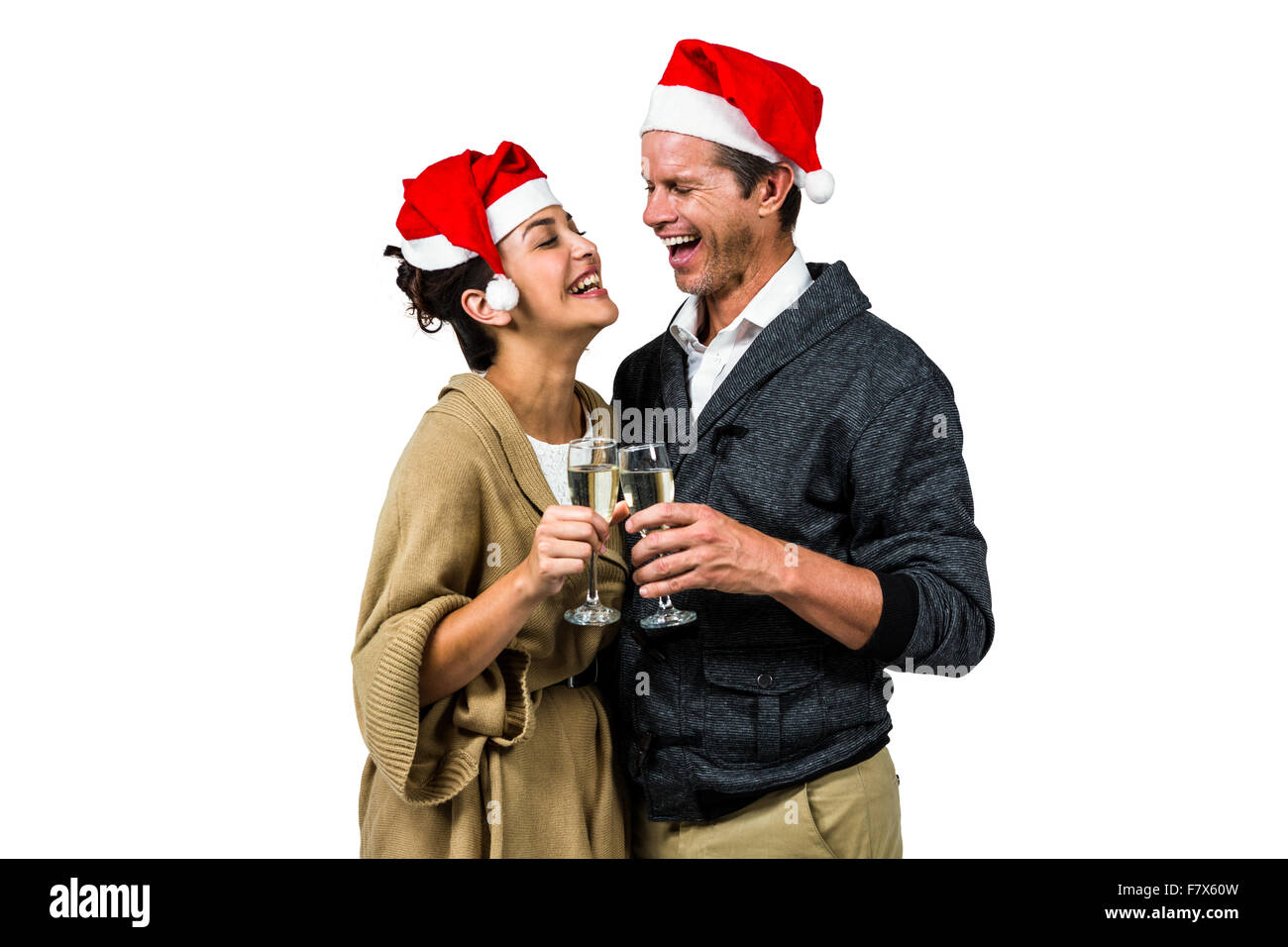 Elegant couple celebrating christmas together Stock Photo - Alamy