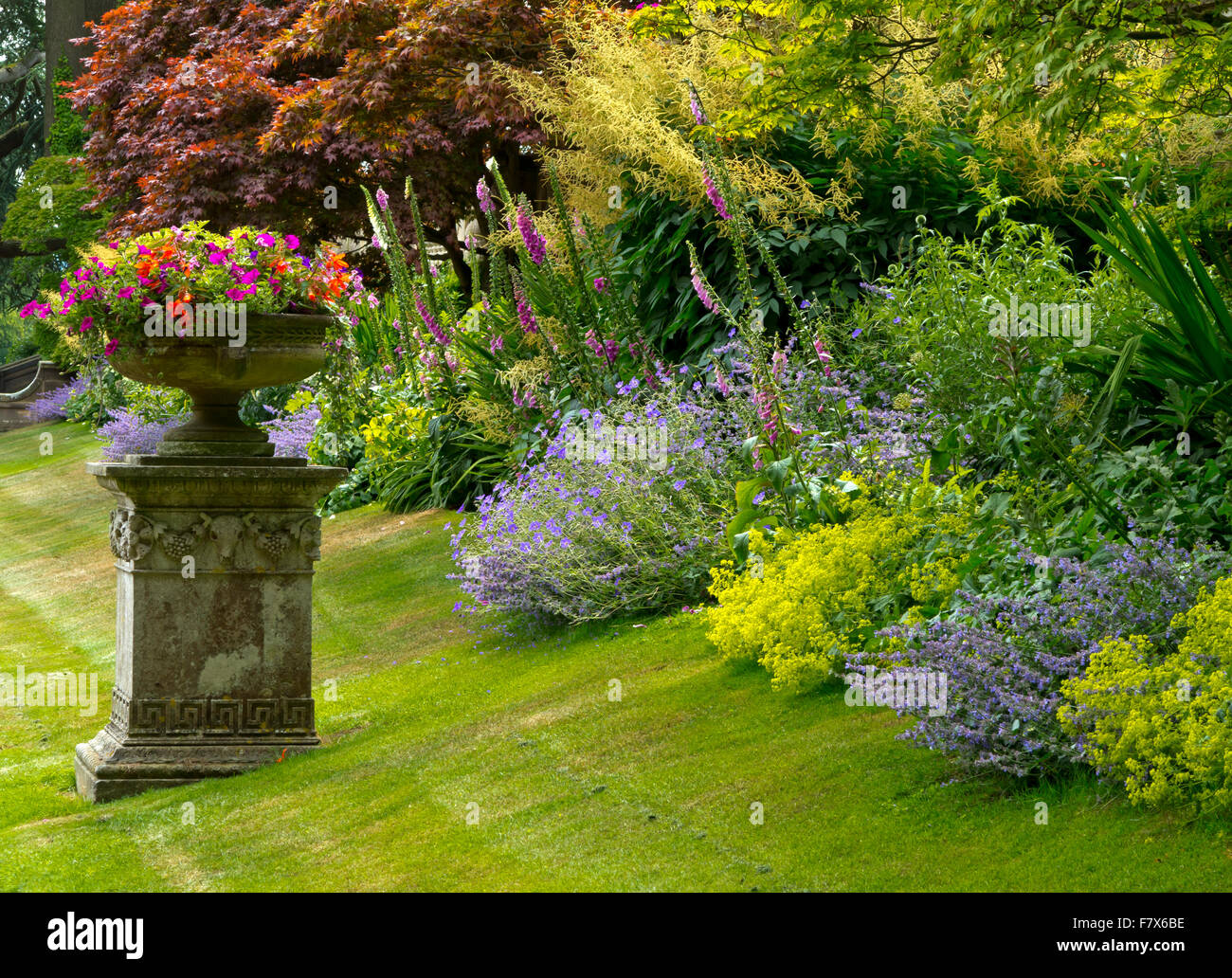 Flower borders in summer at Thornbridge Hall a country house near Great ...