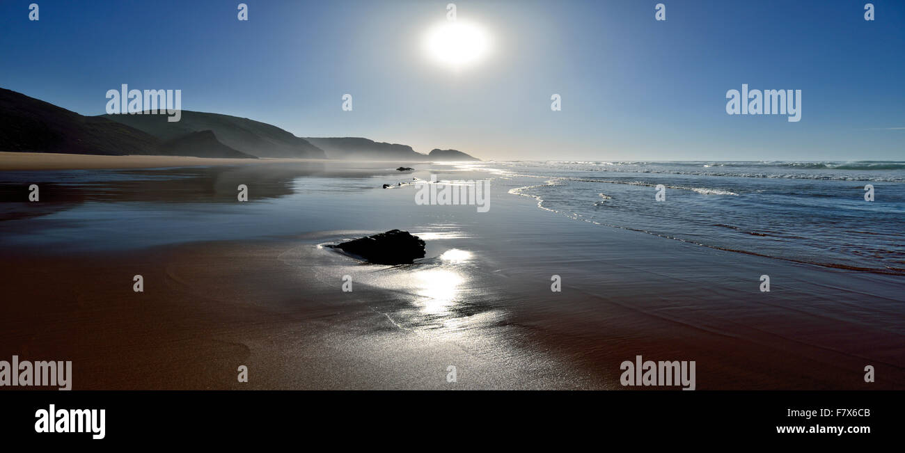 Portugal, Algarve: Panoramic beach scene photographed against the sun ...