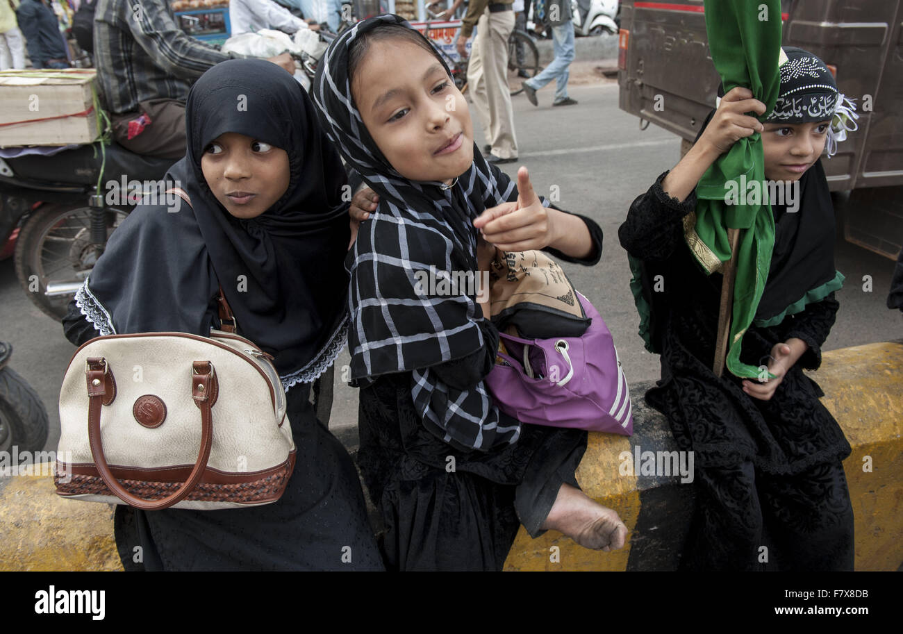 Raipur, India. 3rd Dec, 2015. Indian Shiite Muslims girls watch the ...