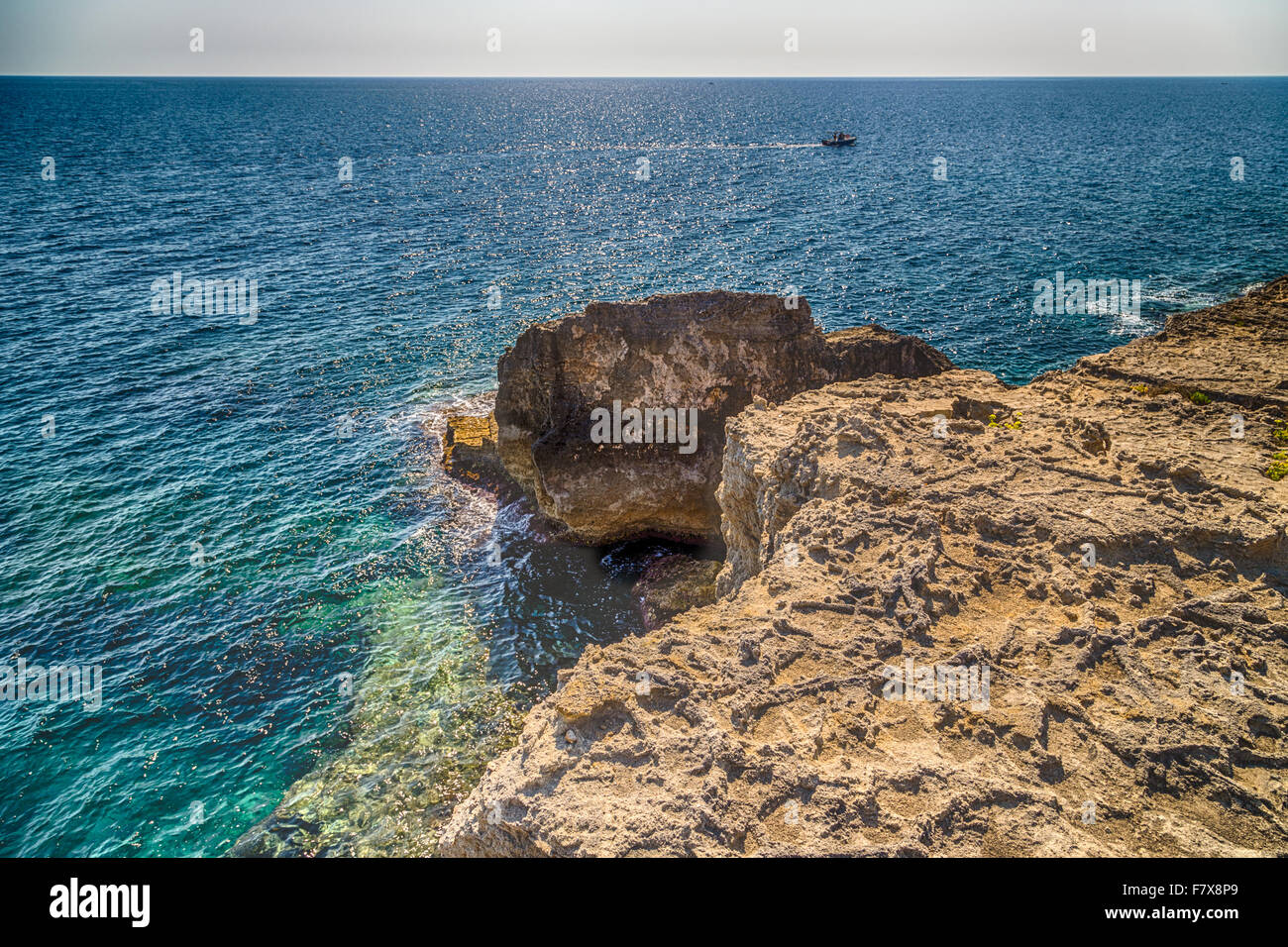 rocks and coves of the coast of Salento of the Ionian Sea in Italy ...