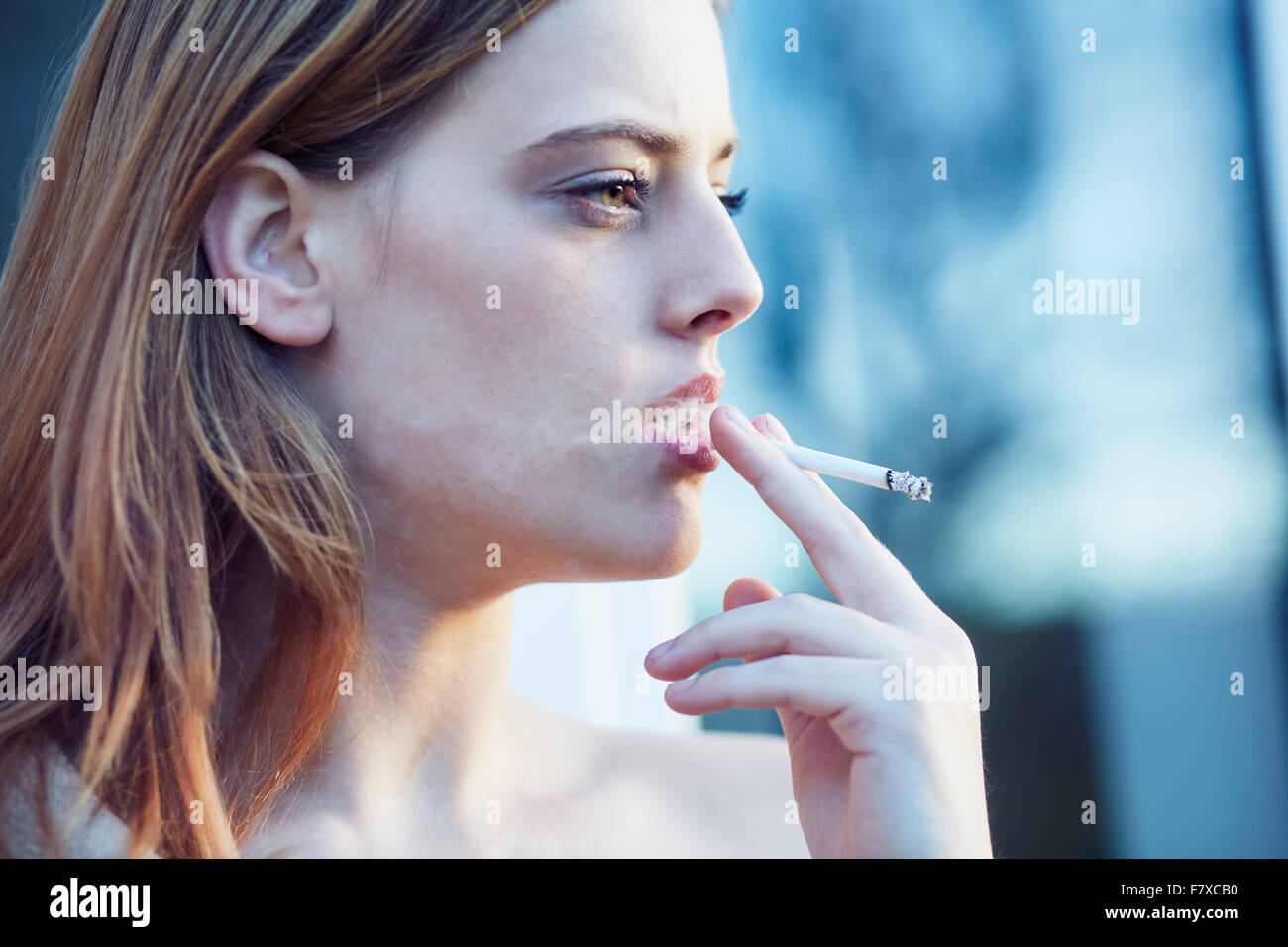 Woman smoking cannabis smoke hi-res stock photography and images - Alamy