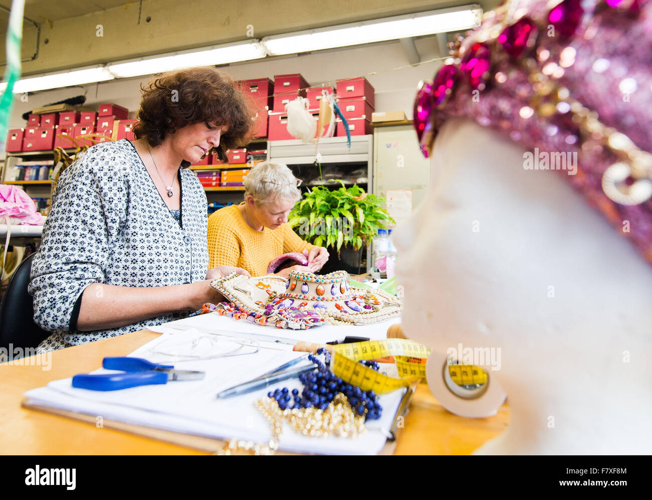 Hamburg, Germany. 3rd Dec, 2015. Milliners Claudia Dorn (l) and Susan ...