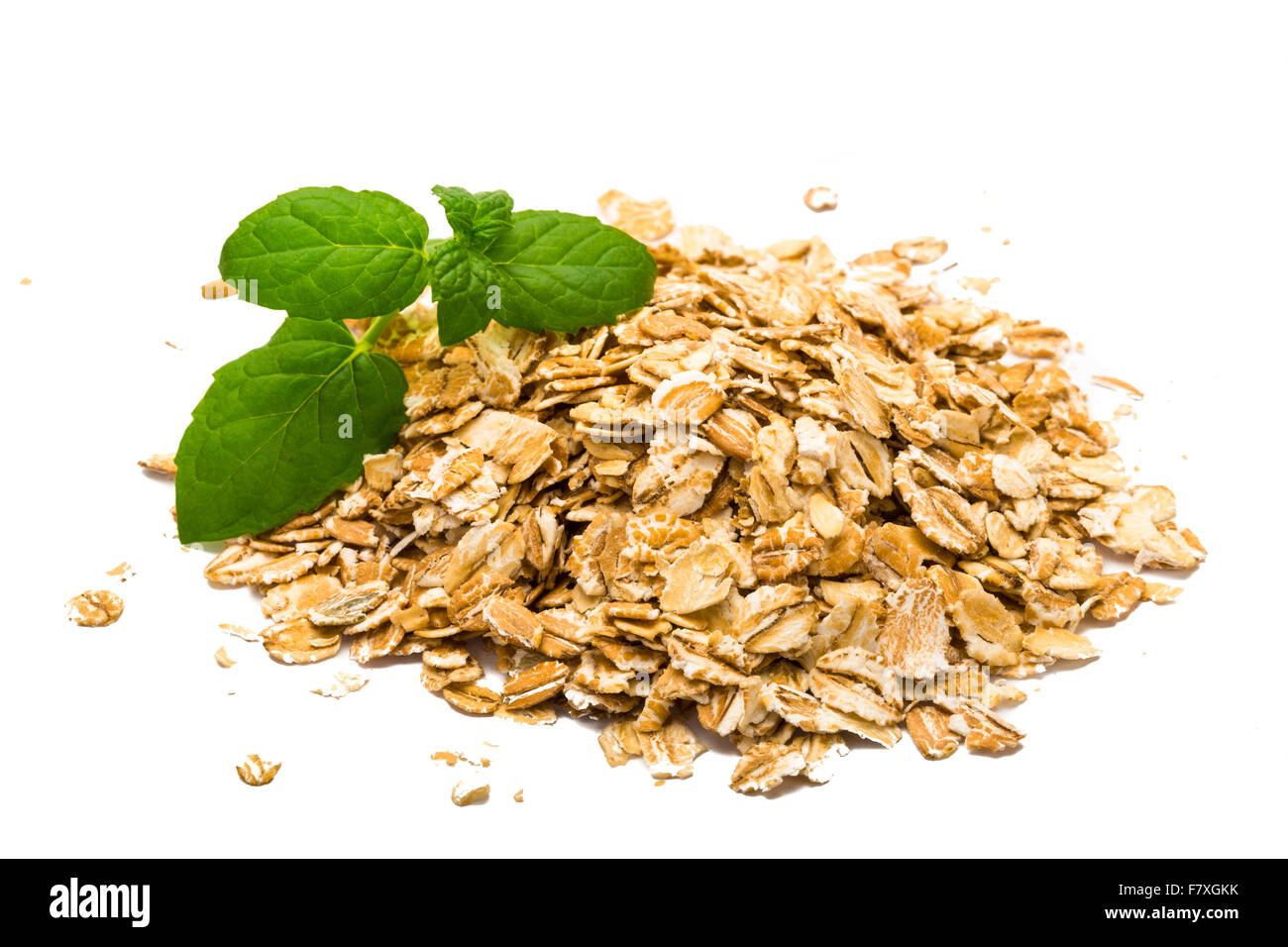 Oats pile with mint branch Stock Photo - Alamy