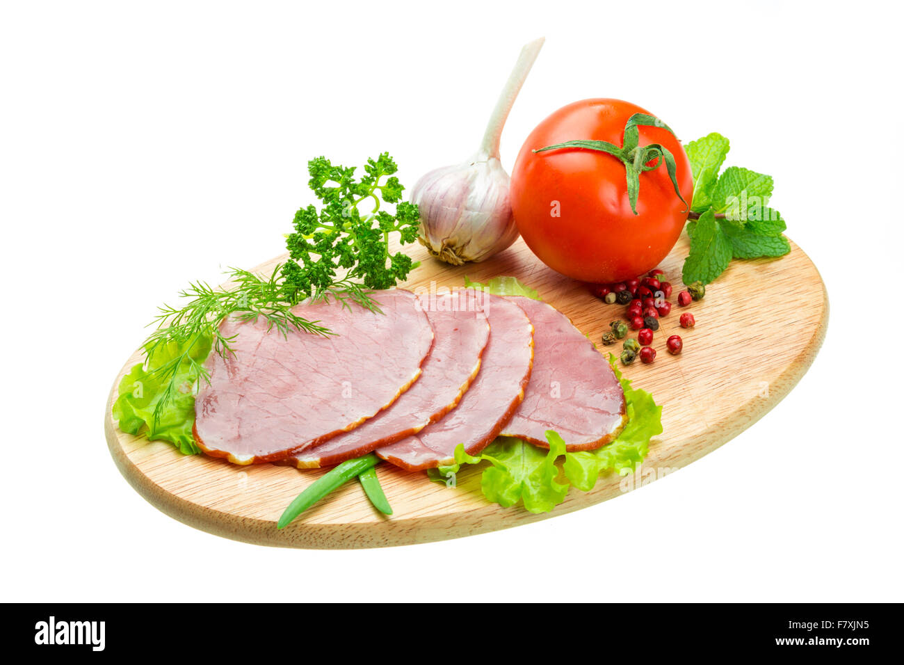 Ripe fresh ham with vegetables Stock Photo - Alamy