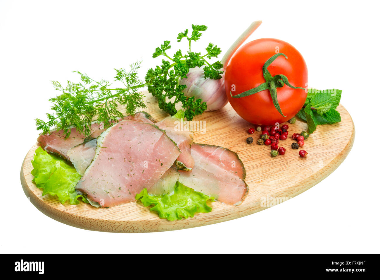 Ripe fresh ham with vegetables Stock Photo - Alamy