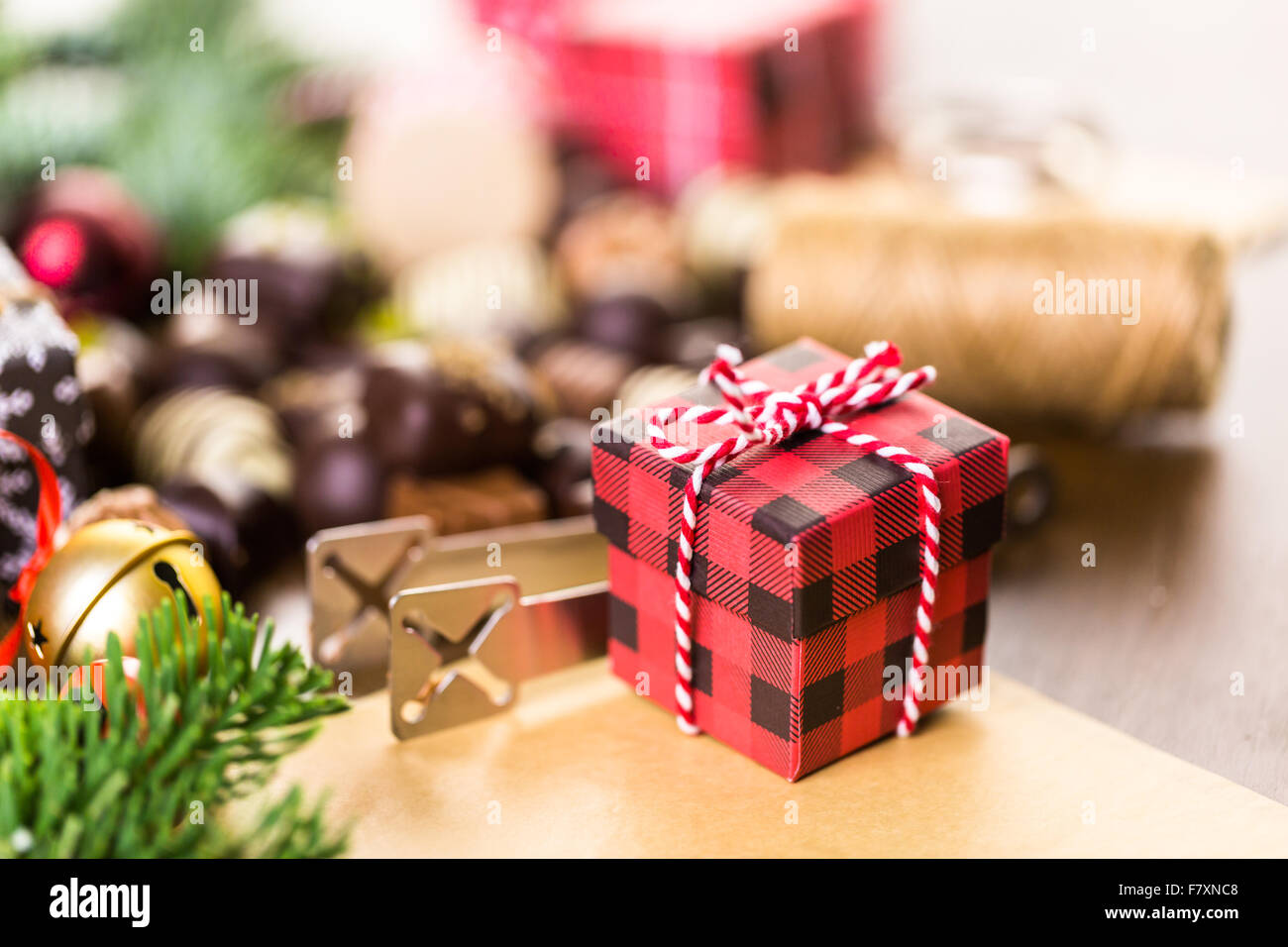 Wrapping assorted chocolates in small boxes for Christmas presents ...