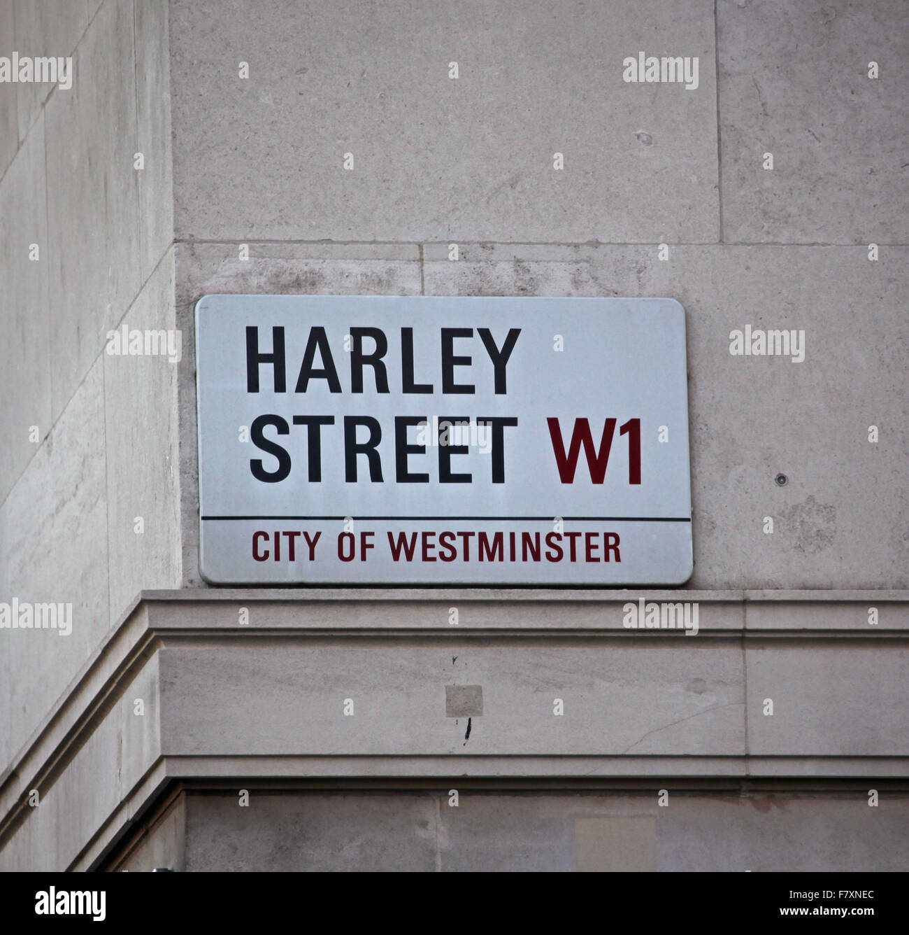 The name of Harley Street in London and this white sign with black and ...