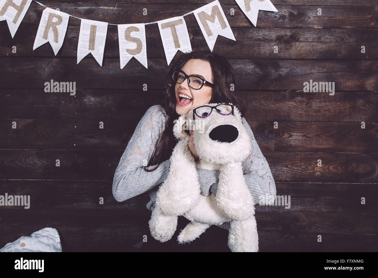 Cute girl hugging a cute toy Stock Photo - Alamy