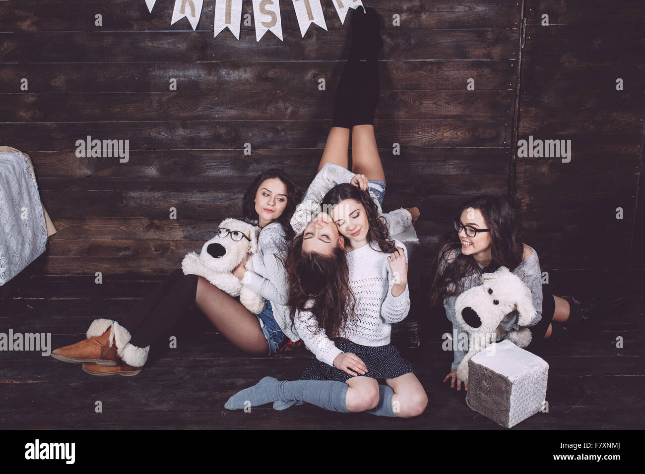 Four charming model posing Stock Photo - Alamy