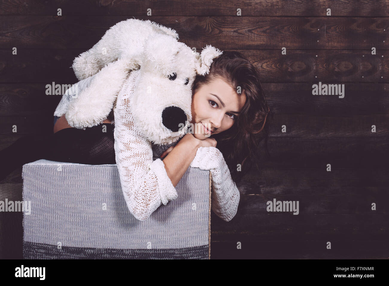 Cute girl hugging a cute toy Stock Photo - Alamy