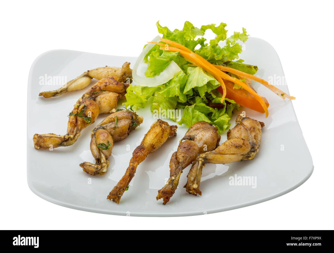 Grilled frog legs - French style Stock Photo - Alamy