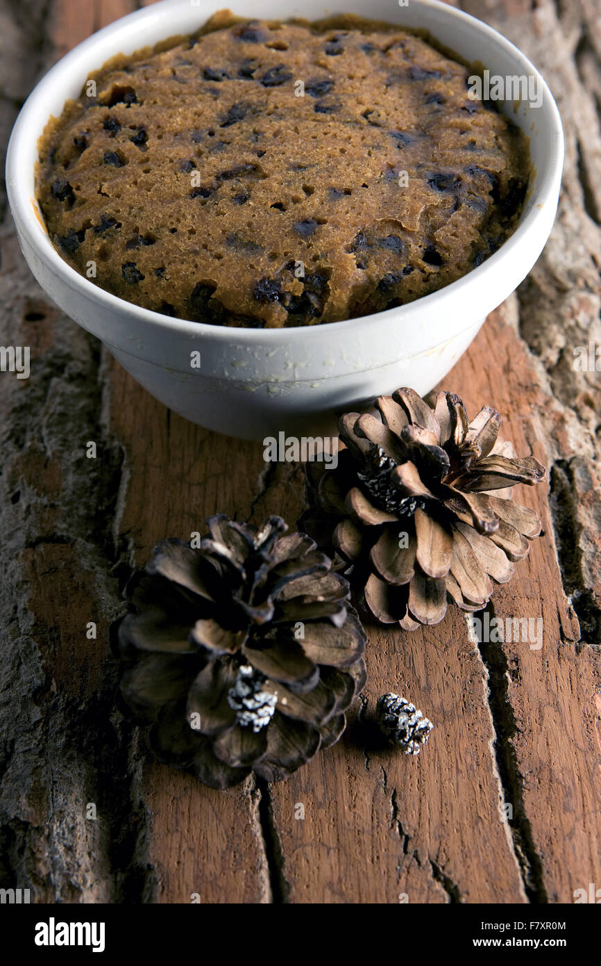 Christmas food – uncooked Christmas pudding ready for the oven Stock ...