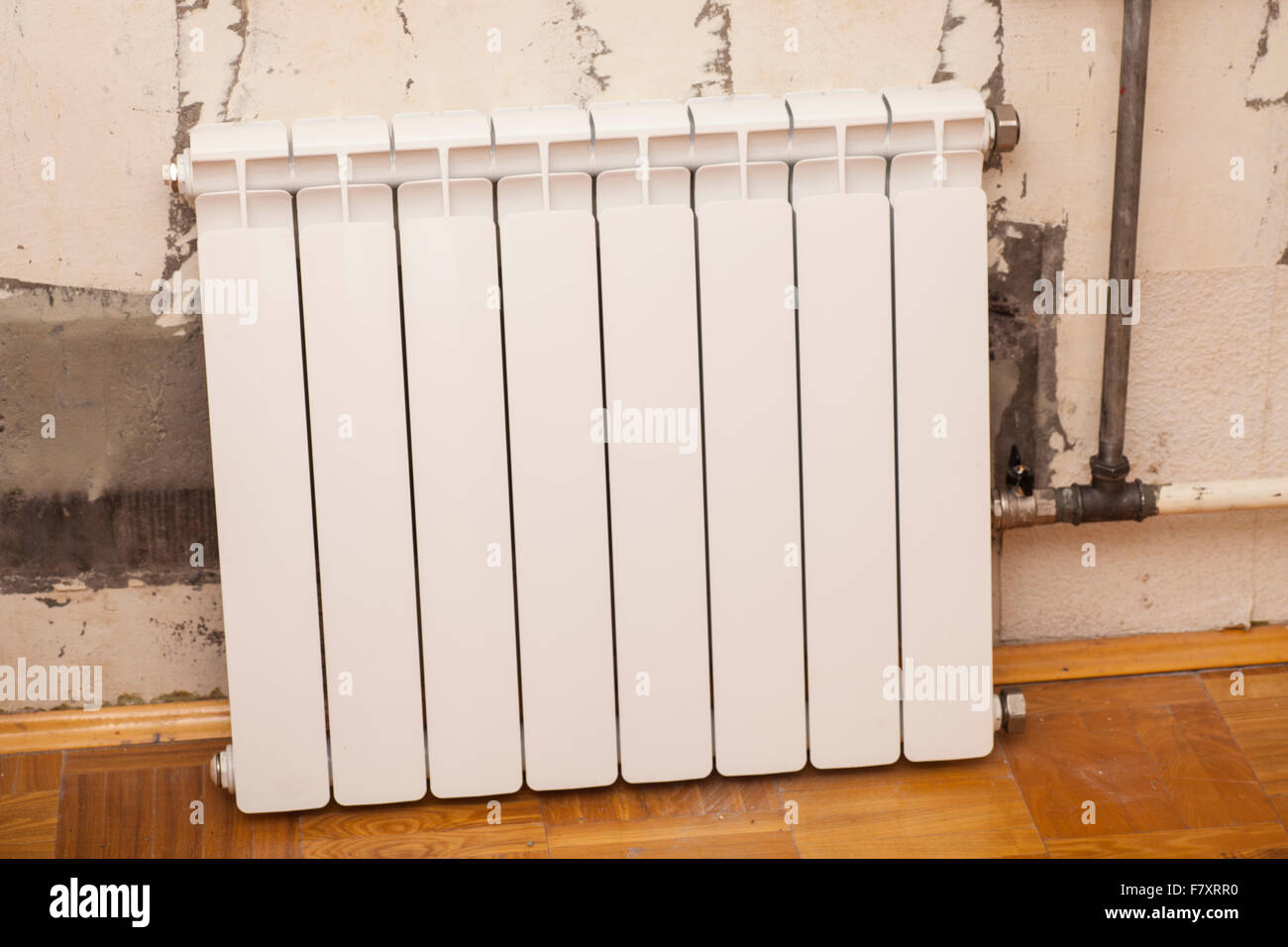 installation of radiator Stock Photo - Alamy