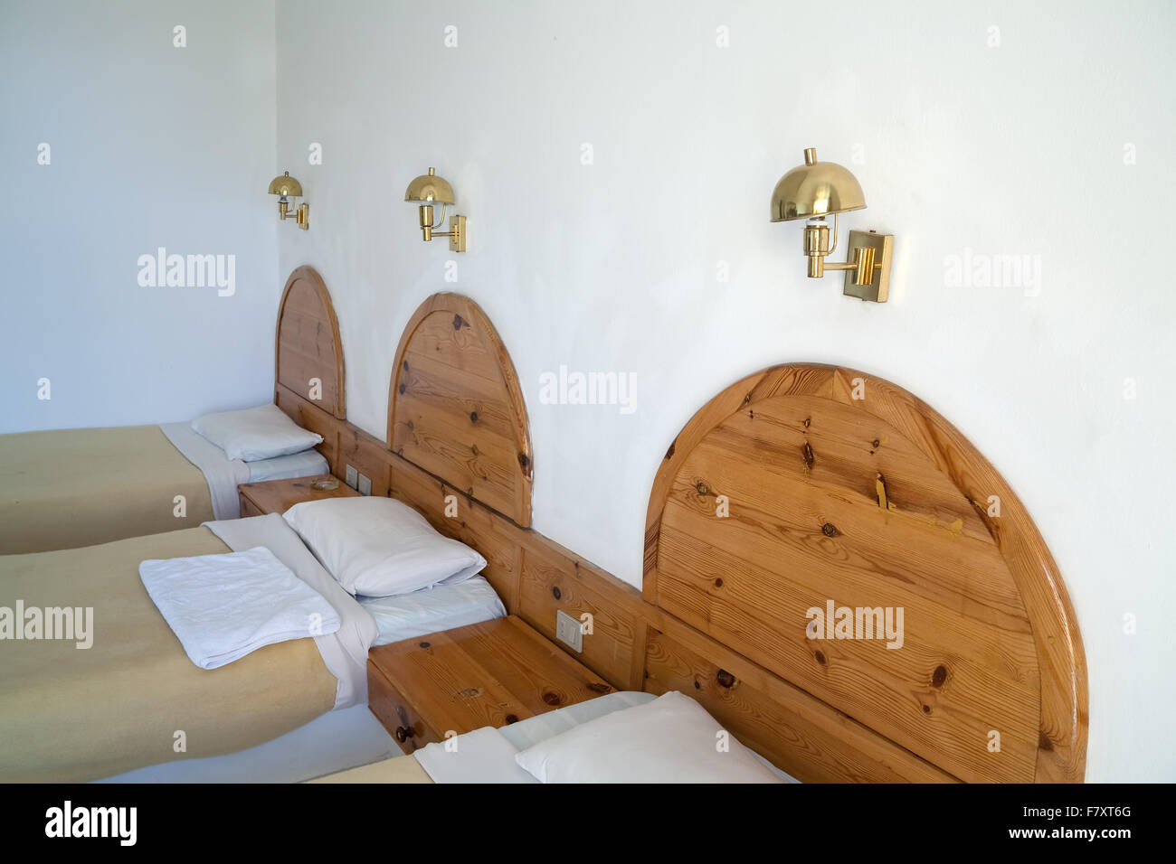 Resort hotel triple room with three beds Stock Photo - Alamy