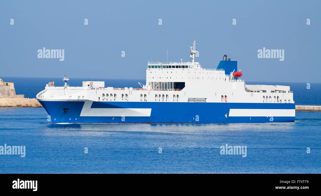 Cargo ship going in to Grand harbour (Valleta, Malta Stock Photo - Alamy