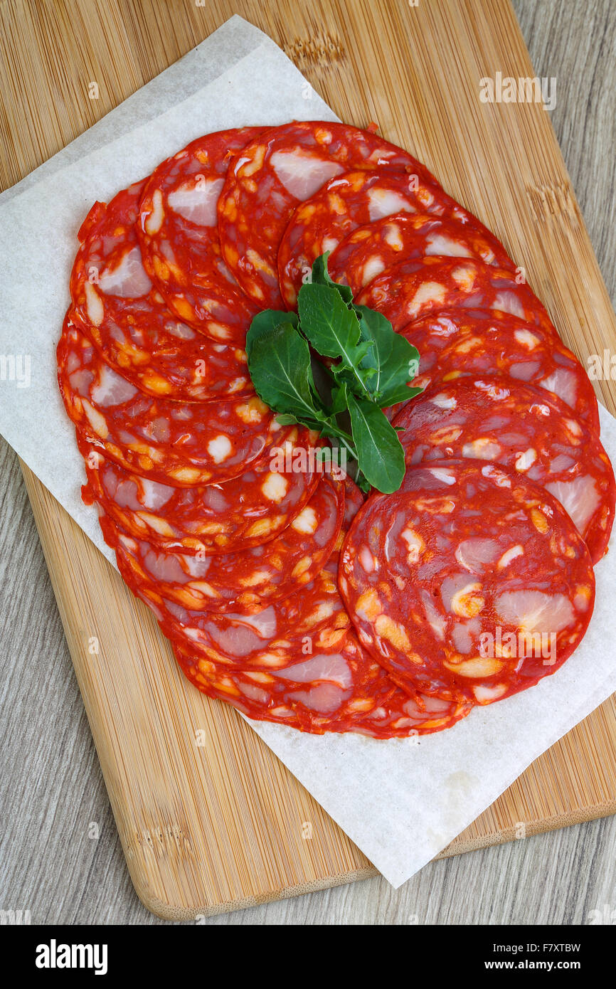 Traditional Spanish salami - Chorizo sausage on the wood background ...