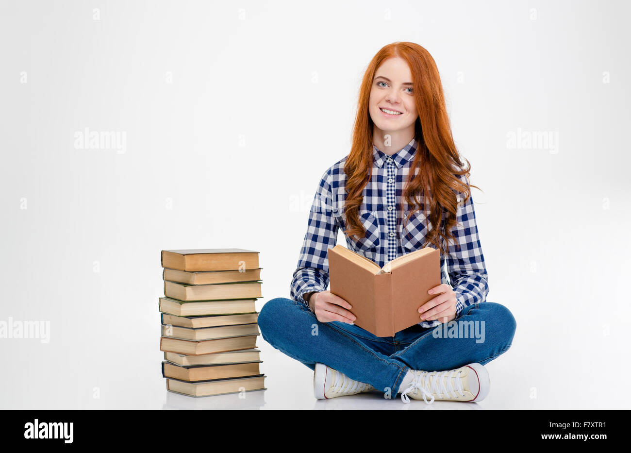 Pretty woman sitting legs crossed hi-res stock photography and images ...