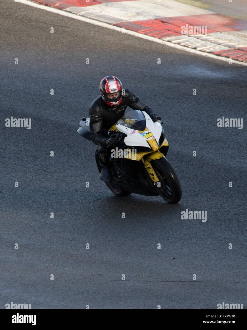 A performance motorcycle rounds Clearwater Bend at Brands Hatch motor ...