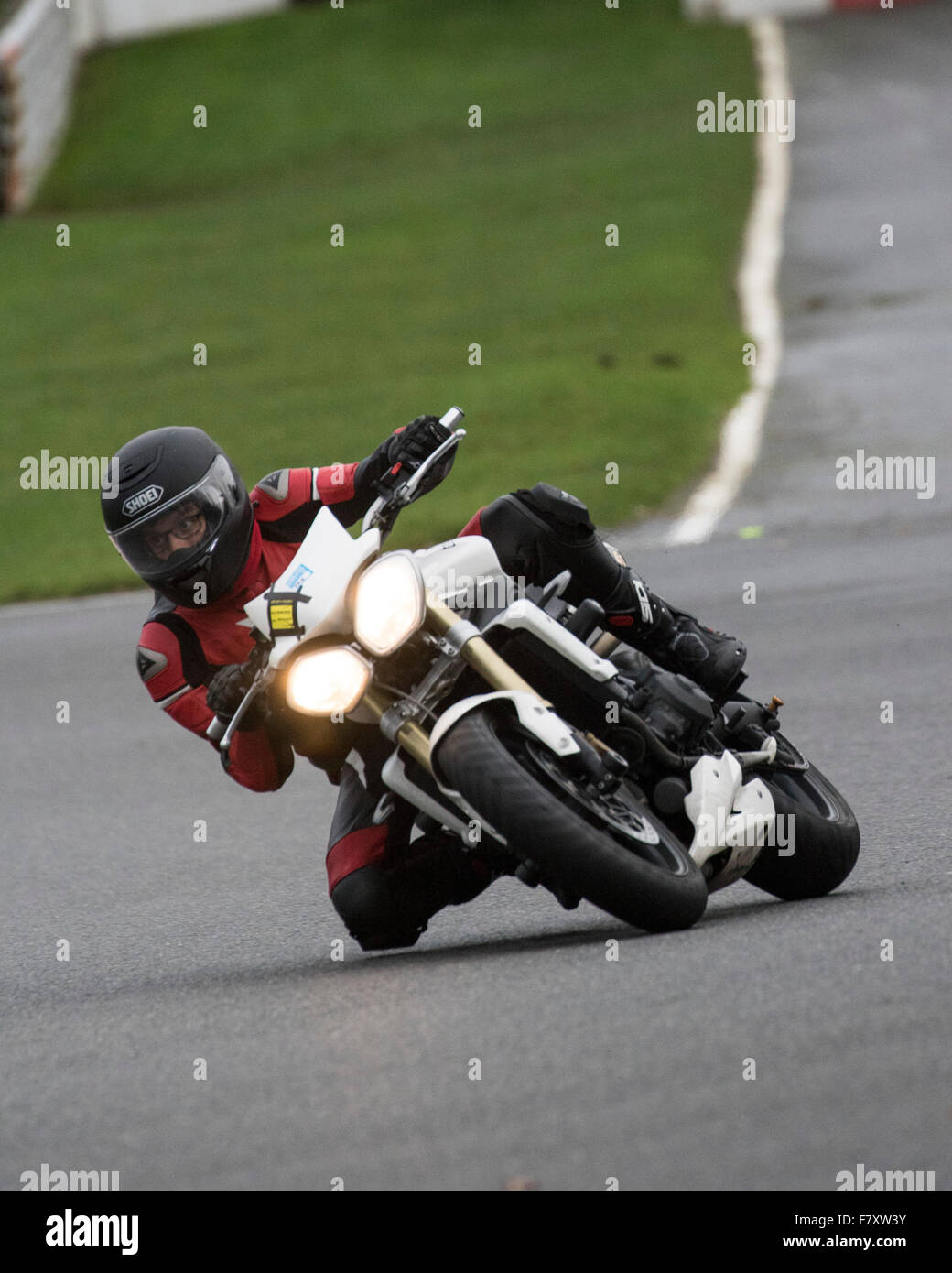 A performance motorcycle rounds Clearwater Bend at Brands Hatch motor ...