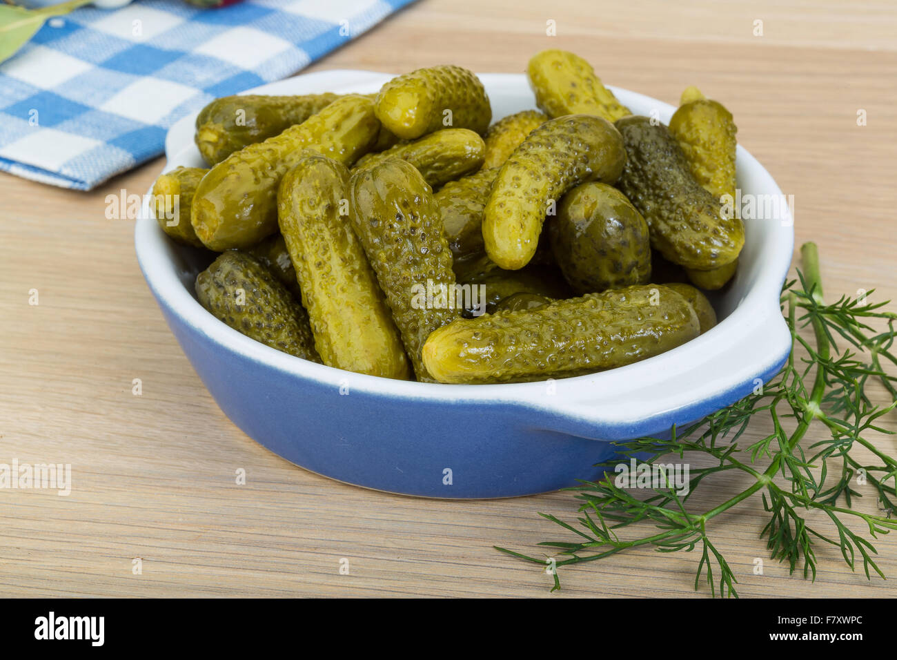 Pickled small cucumber with dill and spices Stock Photo - Alamy