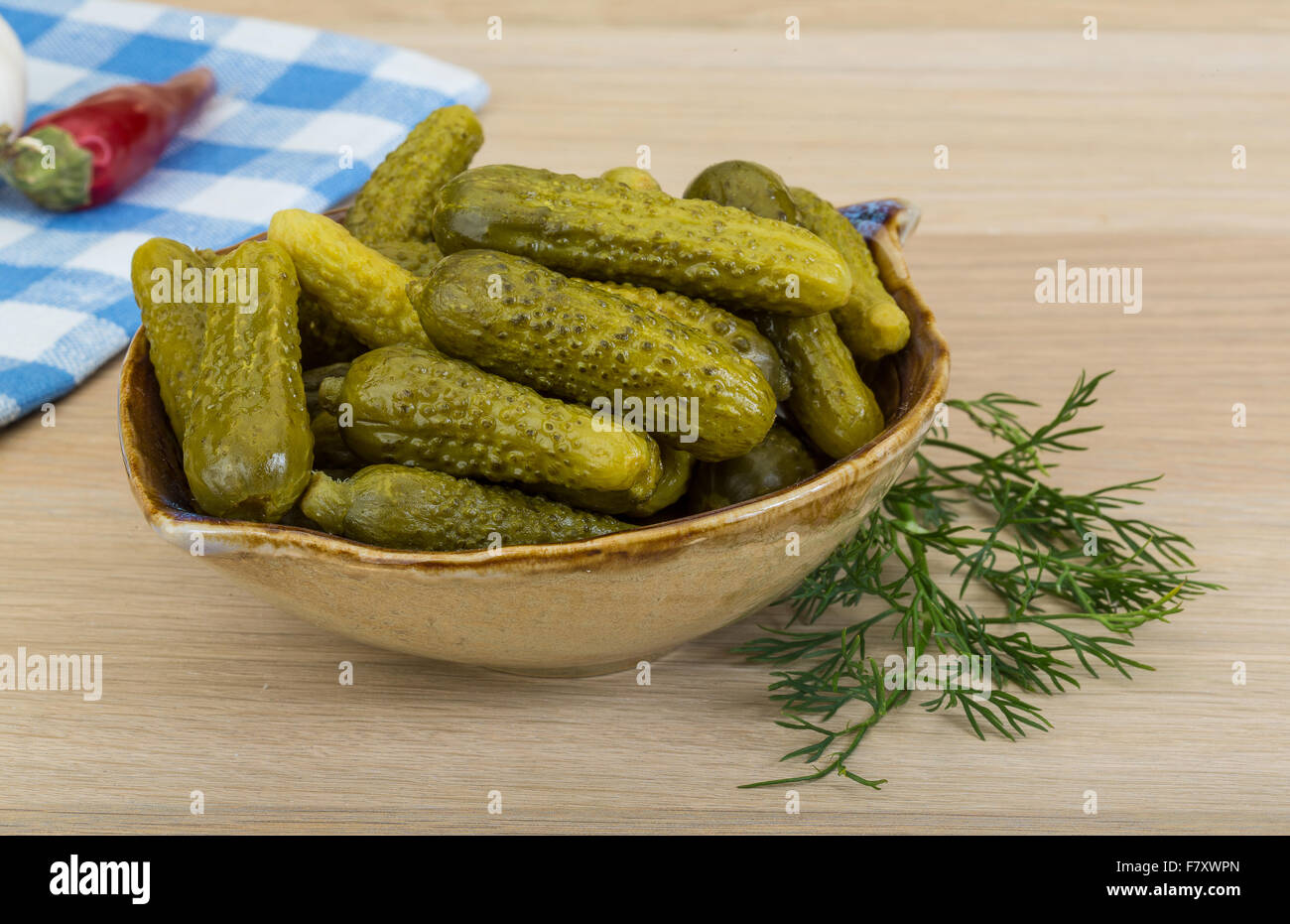Pickled small cucumber with dill and spices Stock Photo - Alamy