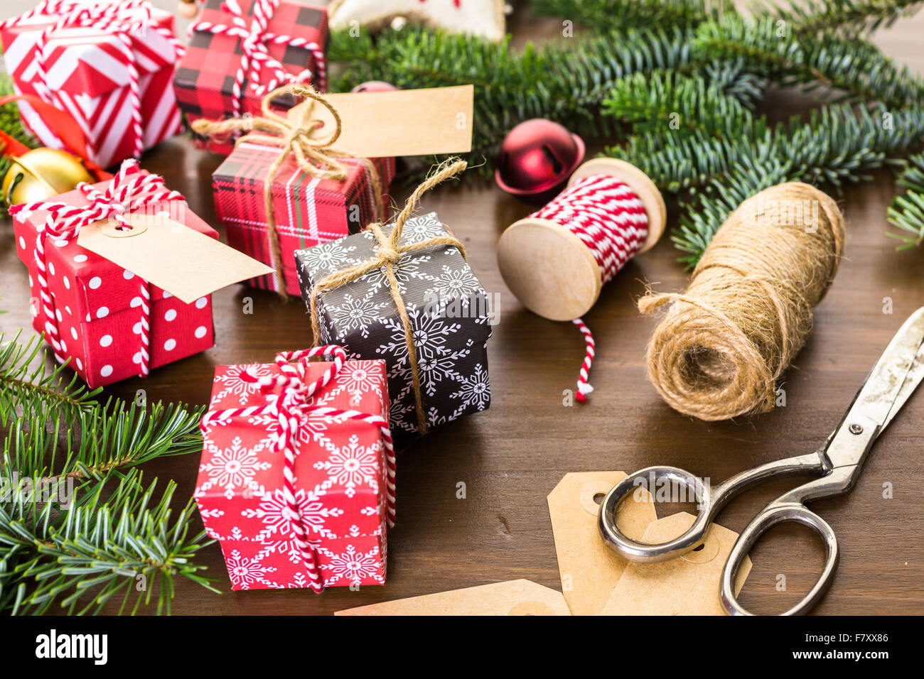 Wrapping assorted chocolates in small boxes for Christmas presents ...