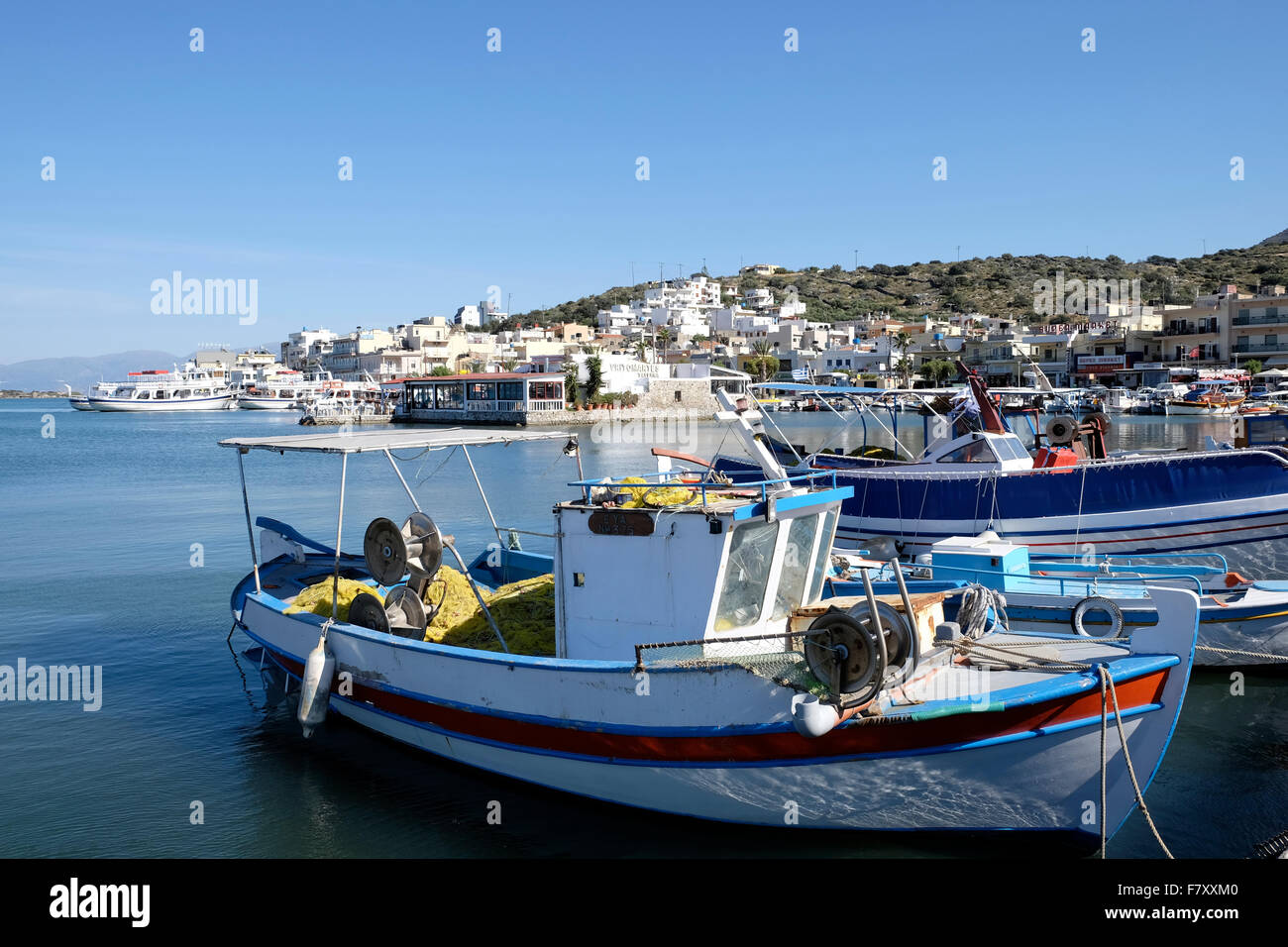 Fishing boats in the harbour at Elounda, Crete Stock Photo - Alamy