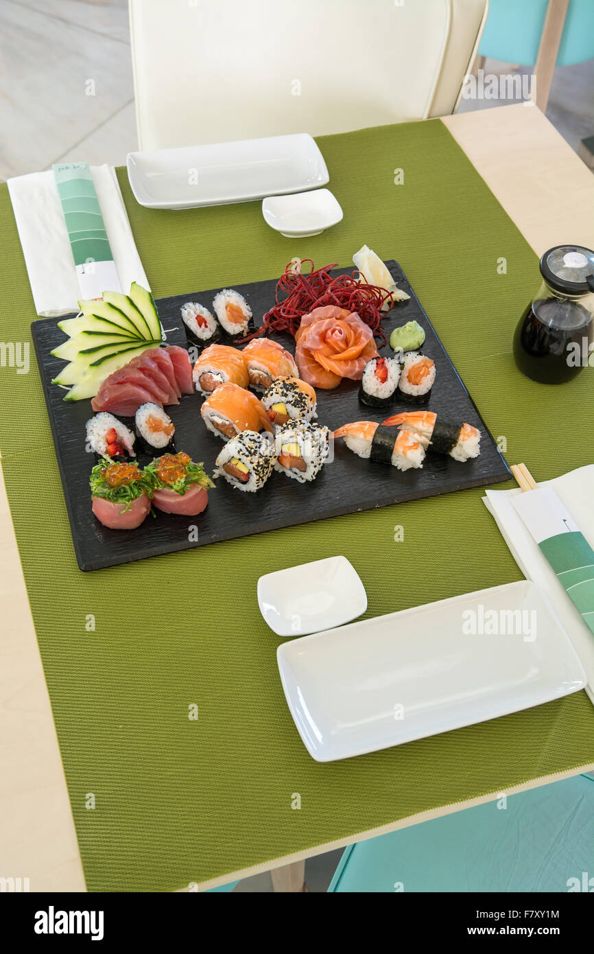 table set with sushi plate Stock Photo - Alamy