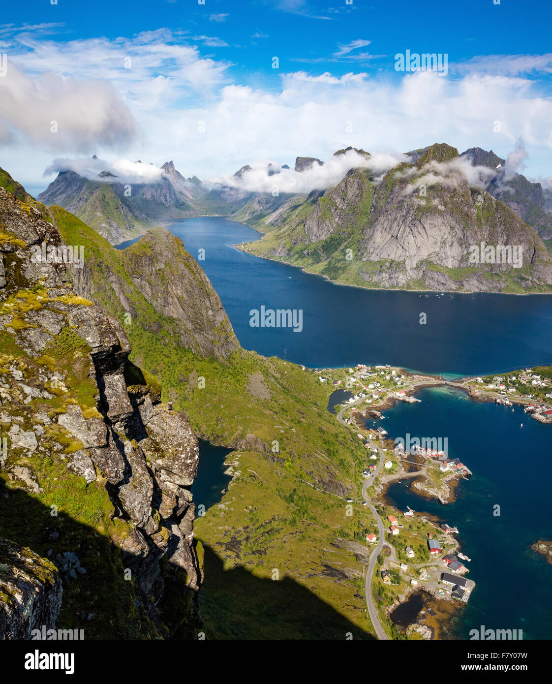 View from Reinebringen over Reine Fjord and the cloud wreathed peaks of ...