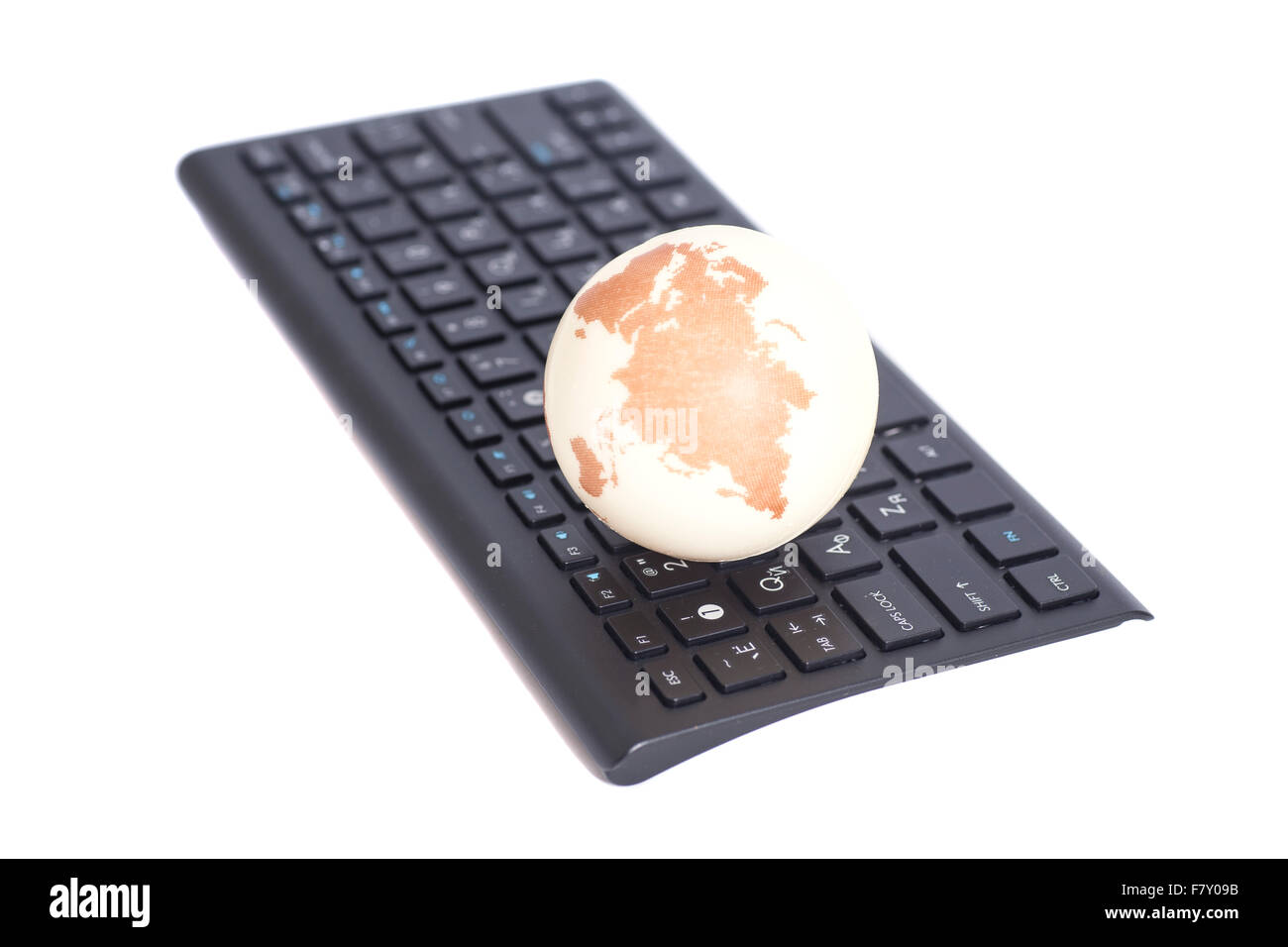 Keyboard on world map Cut Out Stock Images & Pictures - Alamy