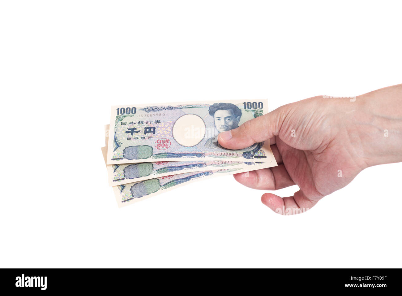 Japanese money Yen in man hand isolated on white Stock Photo - Alamy