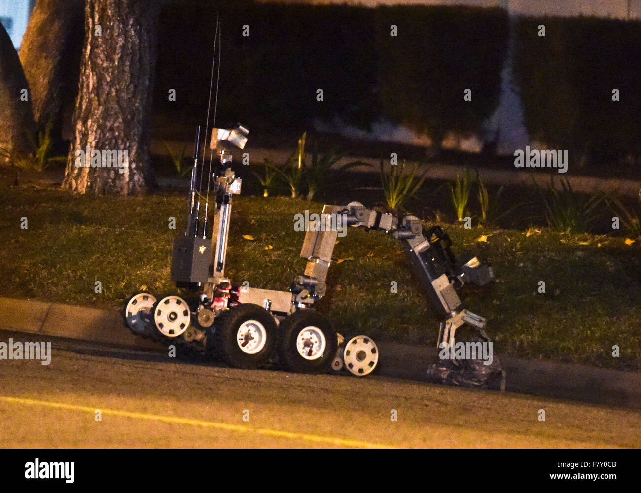 San Bernardino, California, USA. 2nd Dec, 2015. A bomb robot inspects a ...