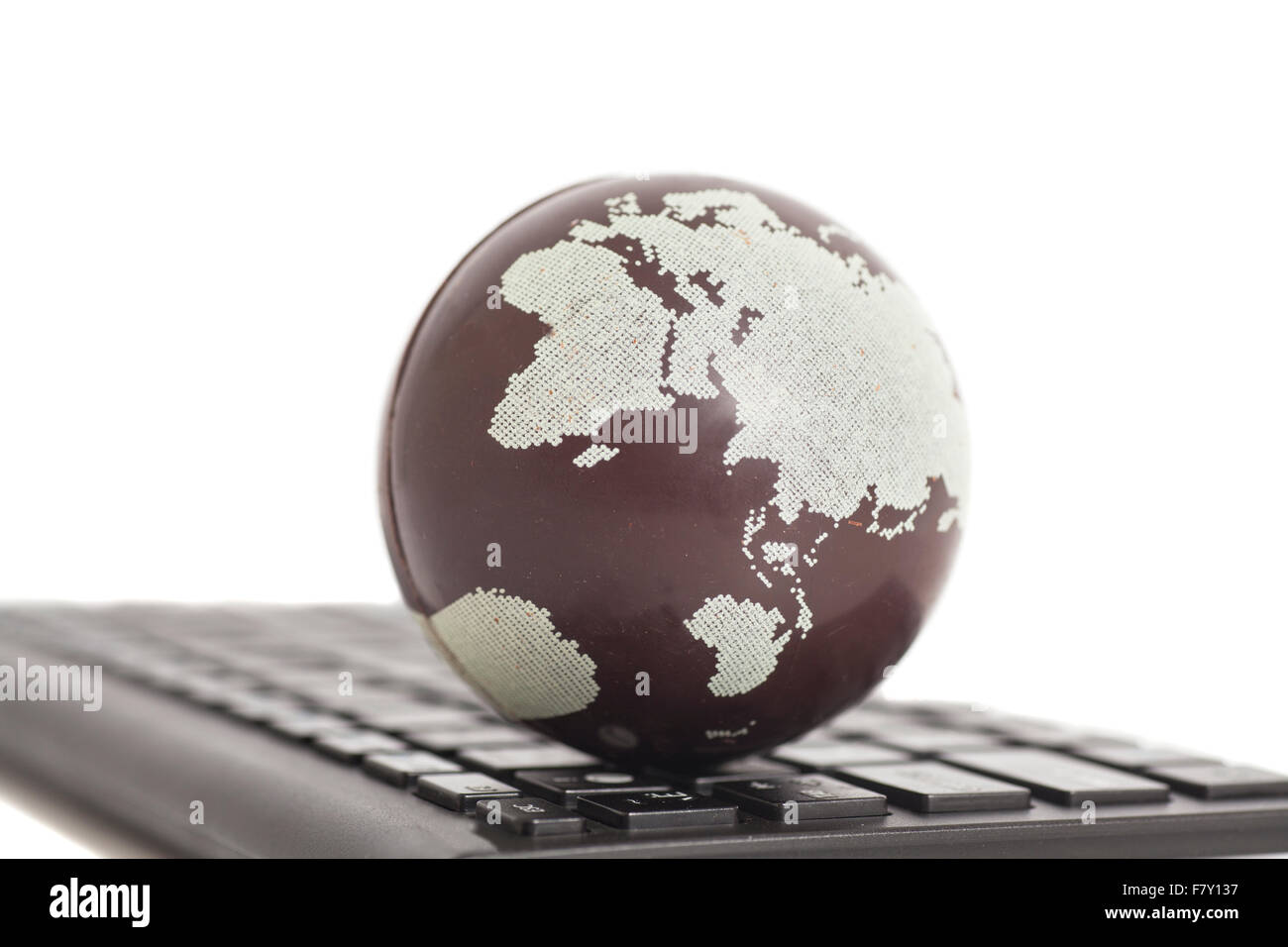 Earth on keyboard isolated on white Stock Photo - Alamy