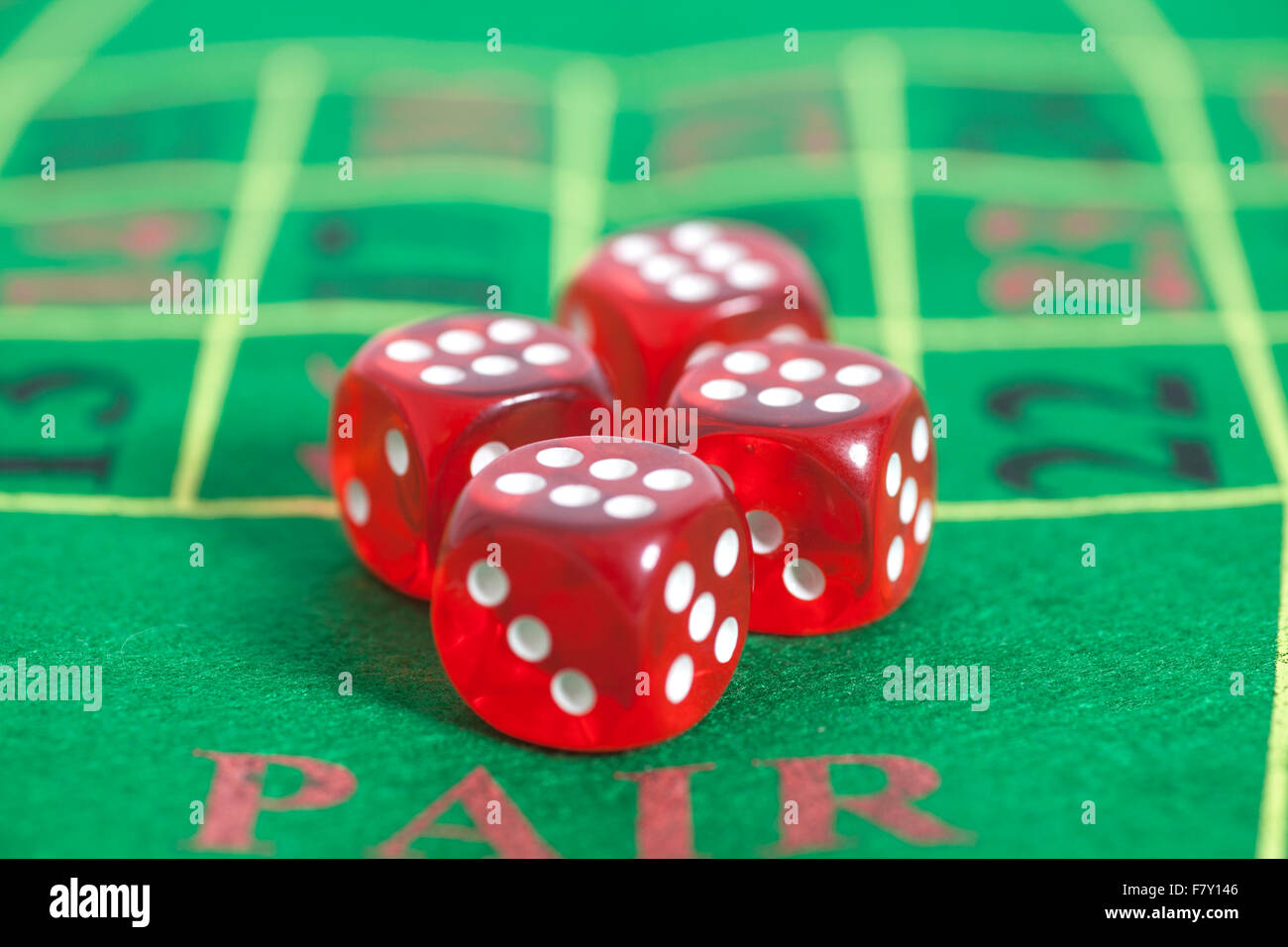 Red dice falling on money hi-res stock photography and images - Alamy