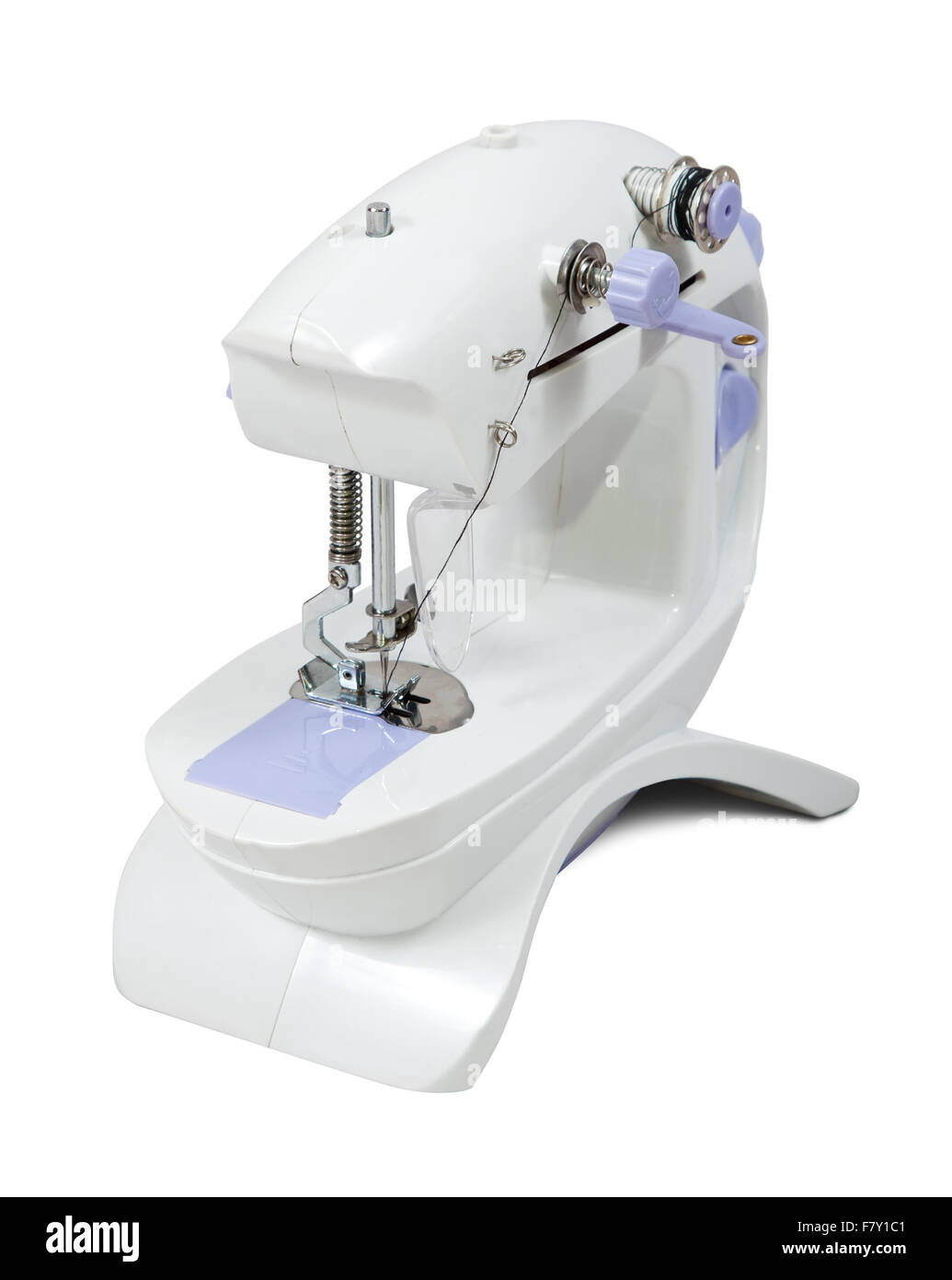 sewing machine. Isolated over white with clipping path Stock Photo - Alamy