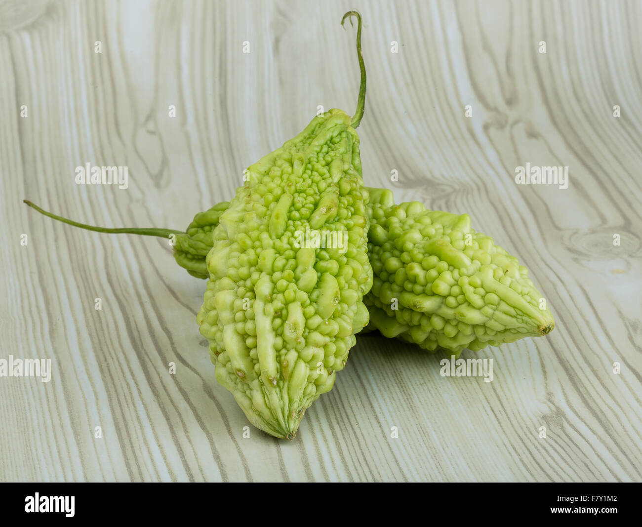 Asian vegetable - momordica on the wood background Stock Photo - Alamy