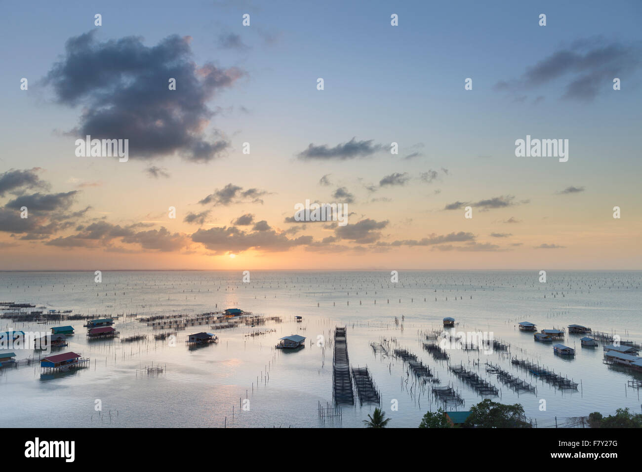 Sunset over Songkhla lake in southern Thailand Stock Photo - Alamy